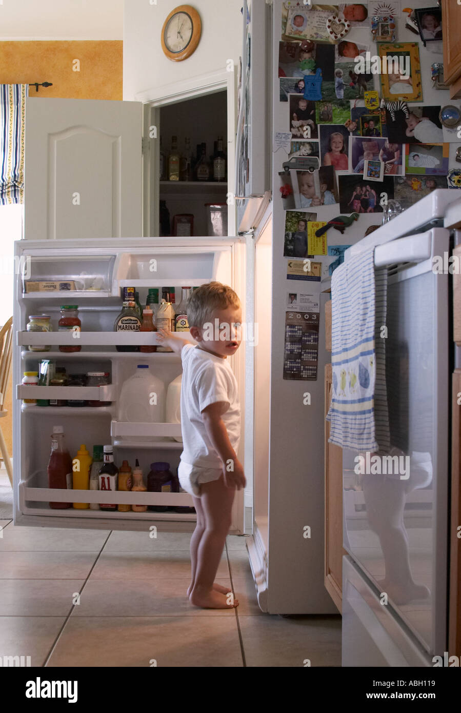 Baby in fridge Stock Photo - Alamy