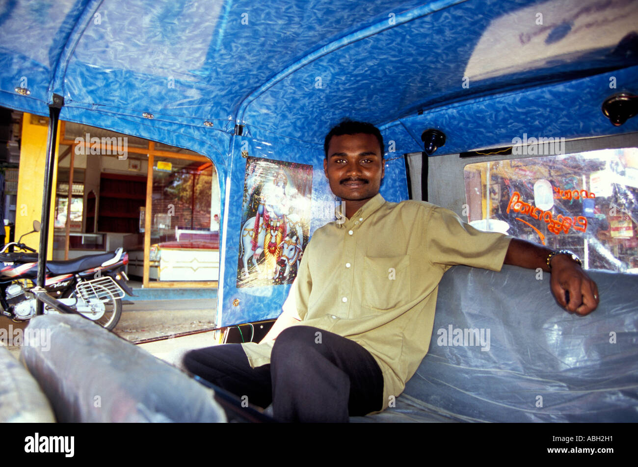 Indian rickshaw driver resting, Anakkara, Kerala, South India Stock ...