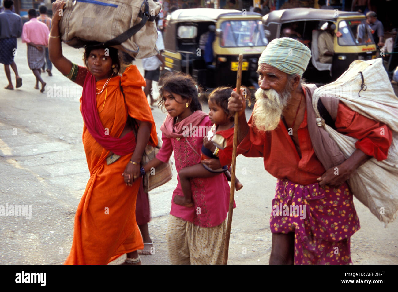 Family of Hindu devotee travellers, Kumily Bus Stand, Kerala, South ...