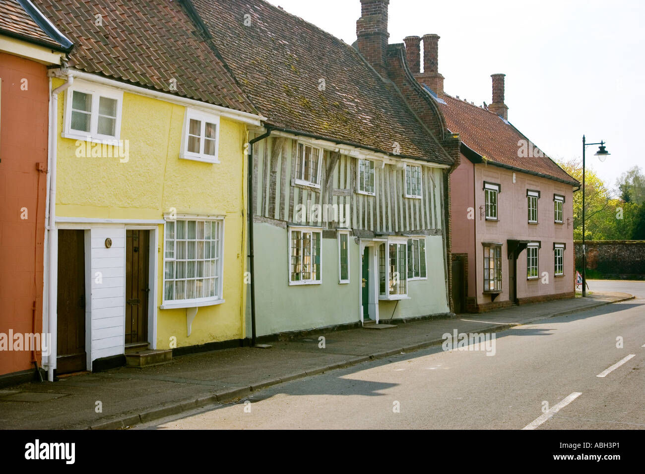 The high street in Ixworth, Suffolk, UK showing the traditional colours ...