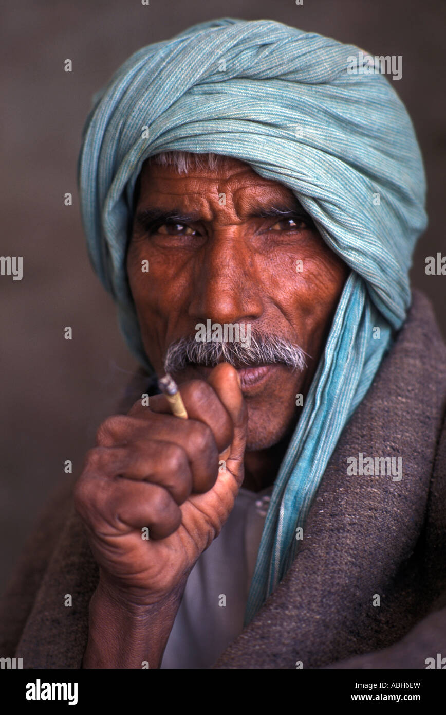 INDIA Rajasthan Portrait of man smoking bindi cigarette Jodhpur Stock ...