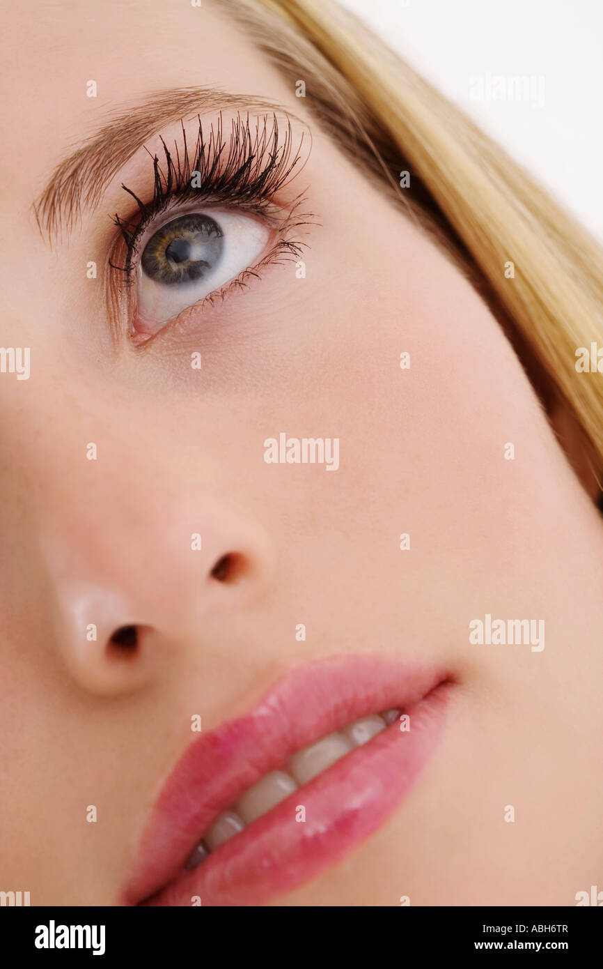 Portrait of a young woman looking at the camera, indoors (studio Stock ...