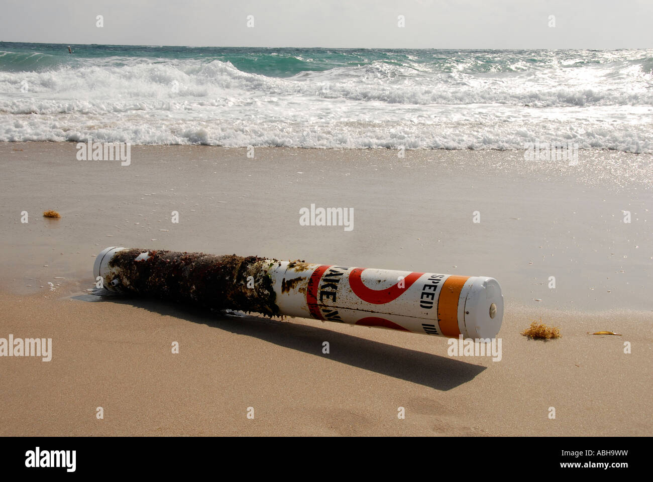 Broken warning buoy on beach Stock Photo - Alamy