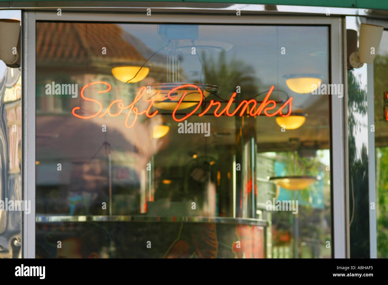 soft drimks neon sign in window of american diner Stock Photo - Alamy