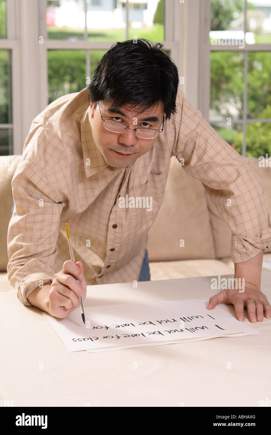 asian man writing chinese calligraphy Stock Photo - Alamy