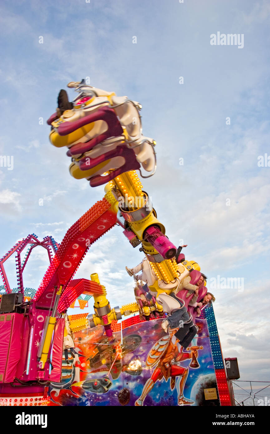 Spinning and rotating fairground ride Stock Photo - Alamy