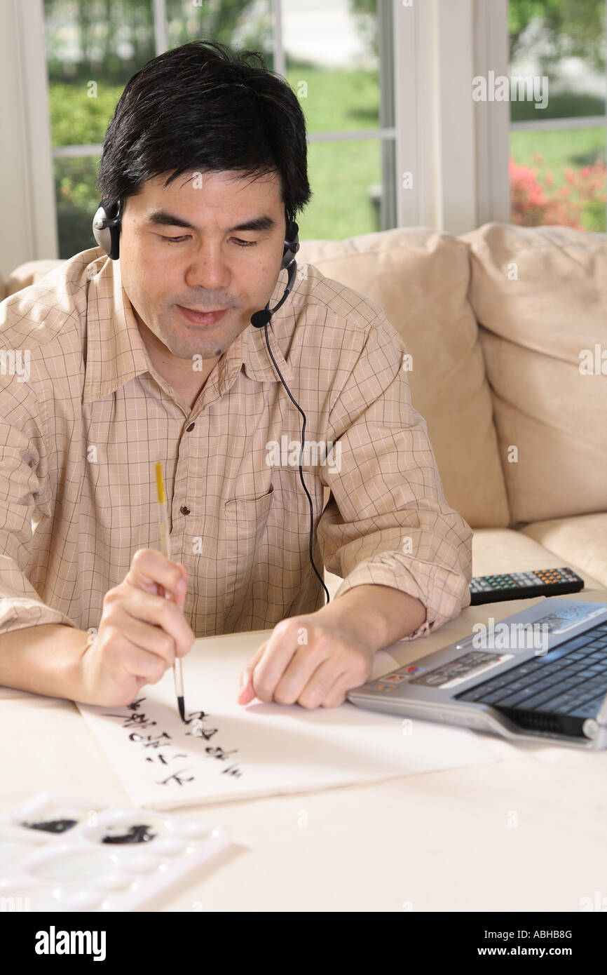 asian man writing chinese calligraphy Stock Photo - Alamy