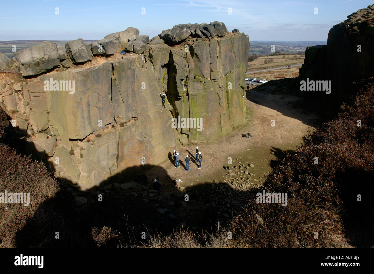 Rock climbing at the Cow and Calf Rocks, Ilkley, Yorkshire UK Stock ...