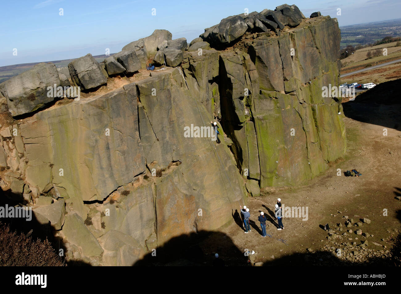 Rock climbing at the Cow and Calf Rocks, Ilkley, Yorkshire UK Stock ...