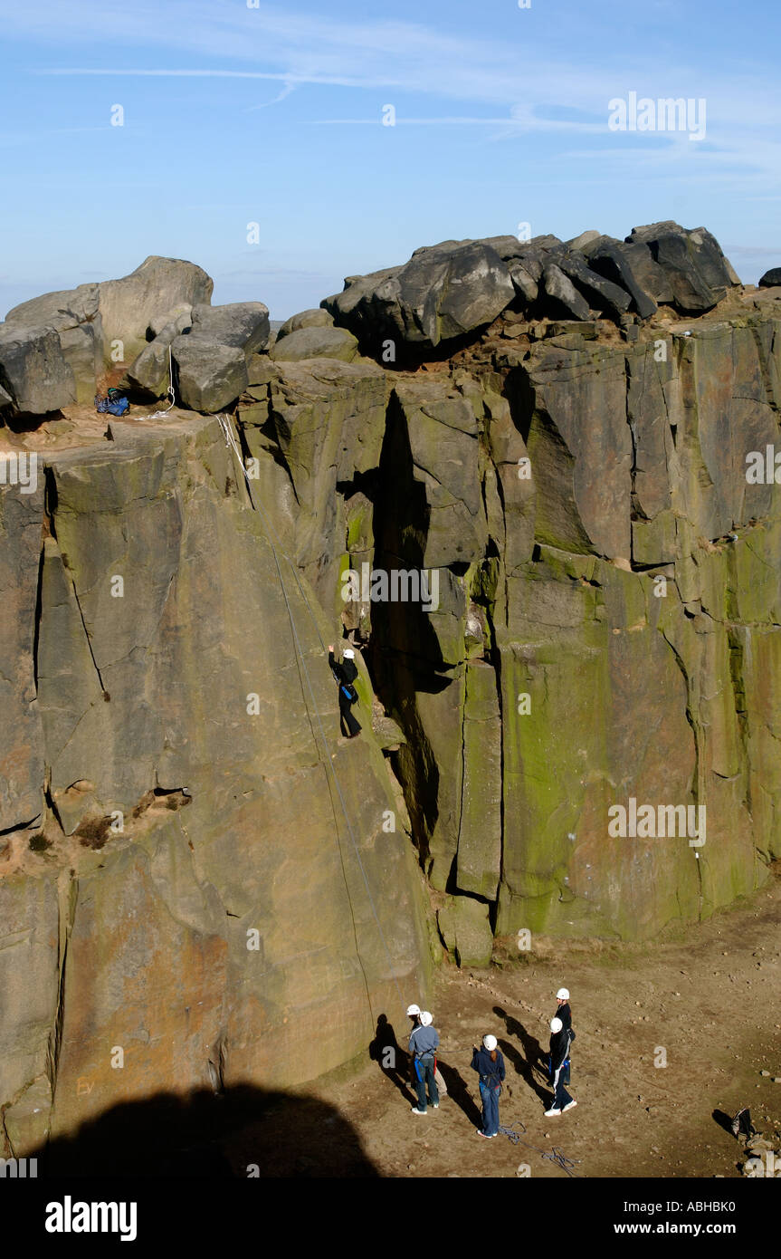 Rock climbing at the Cow and Calf Rocks, Ilkley, Yorkshire UK Stock ...