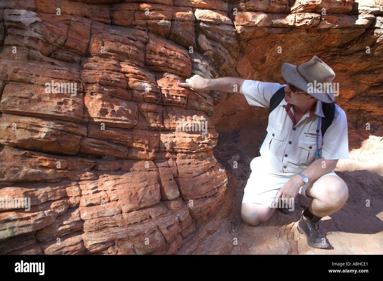 Tour guide explains complex geological erosion processes that led to ...