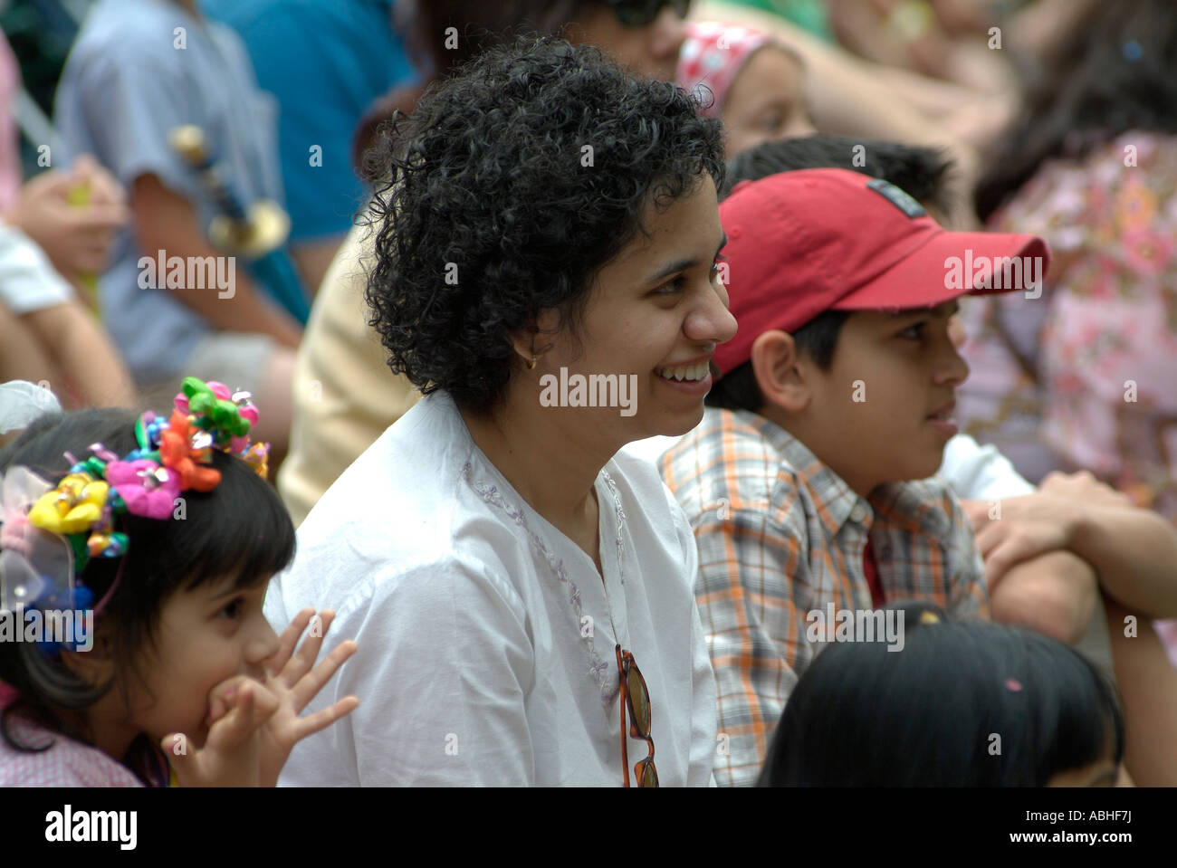 People watching an outside show in San Antonio Stock Photo - Alamy