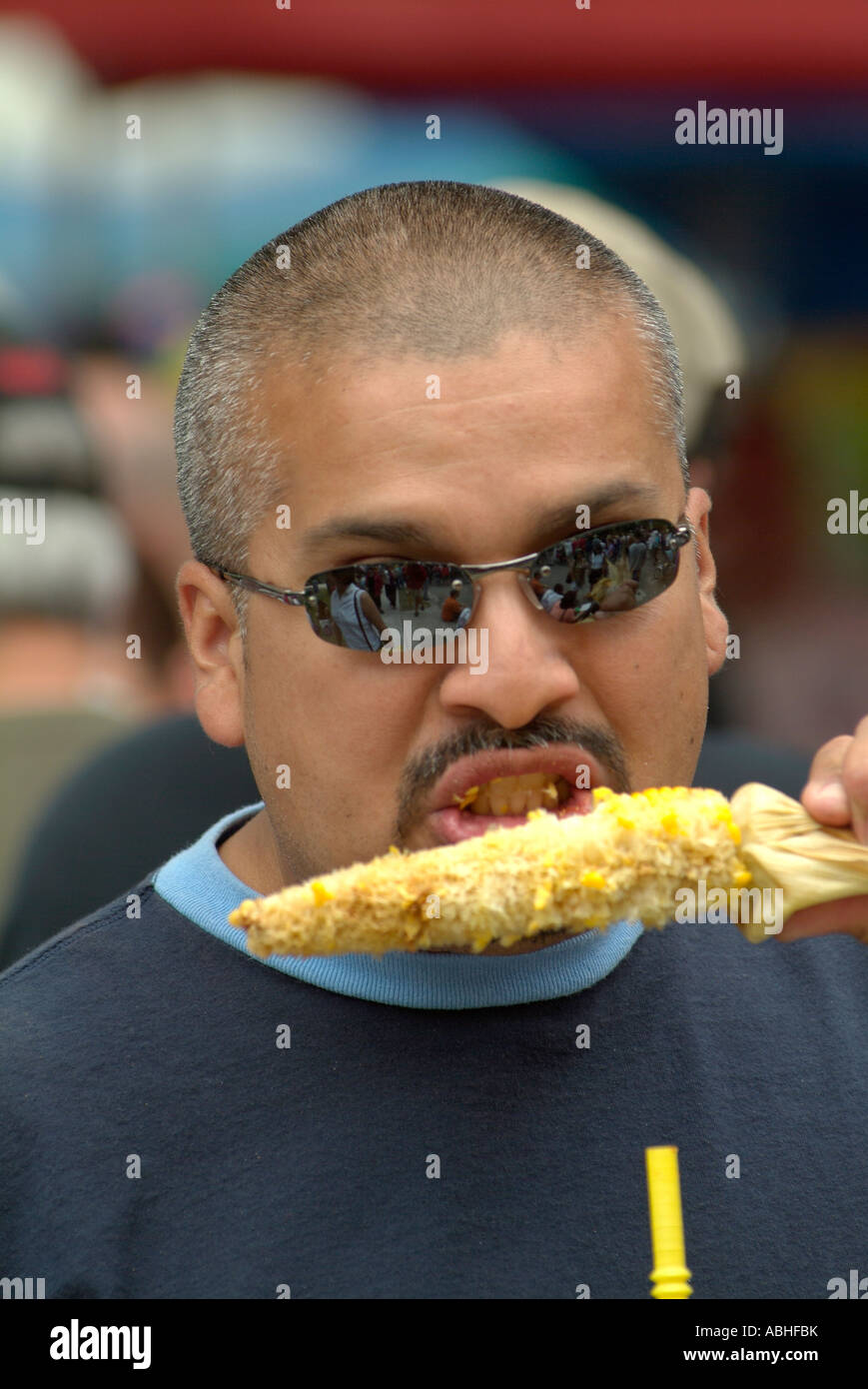 Man eating corn in San Antonio, Texas Stock Photo - Alamy