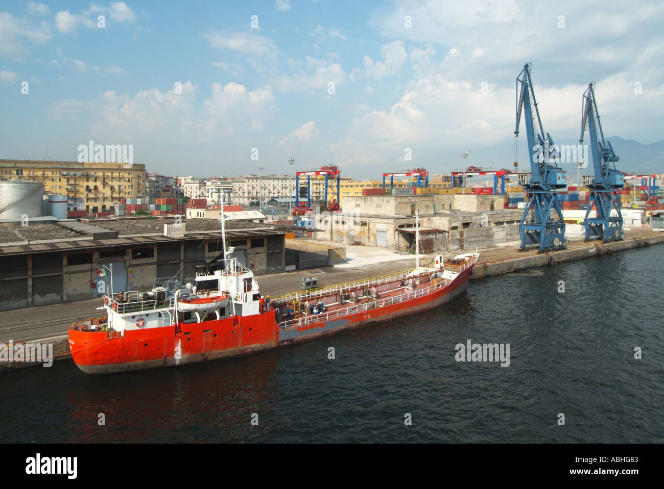 Naples port freighter alongside dock installations Stock Photo - Alamy
