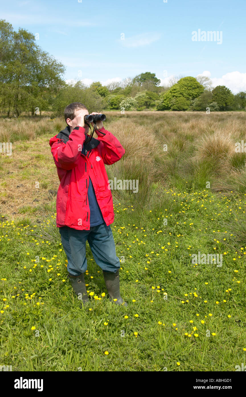 man birding watching at Heysham Moss nature reserve With red jacket ...