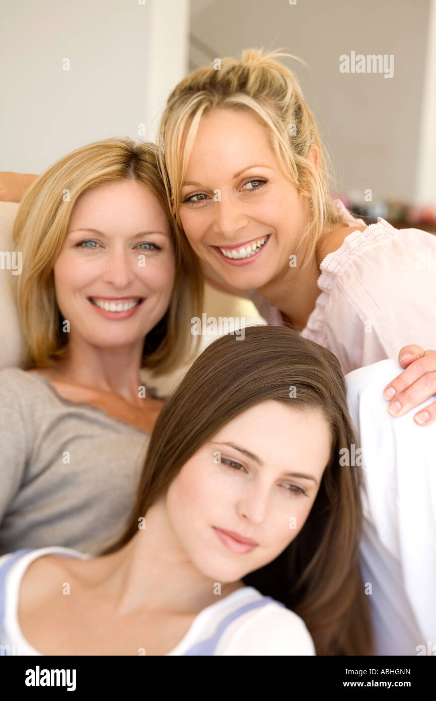 Three smiling women, indoors Stock Photo - Alamy