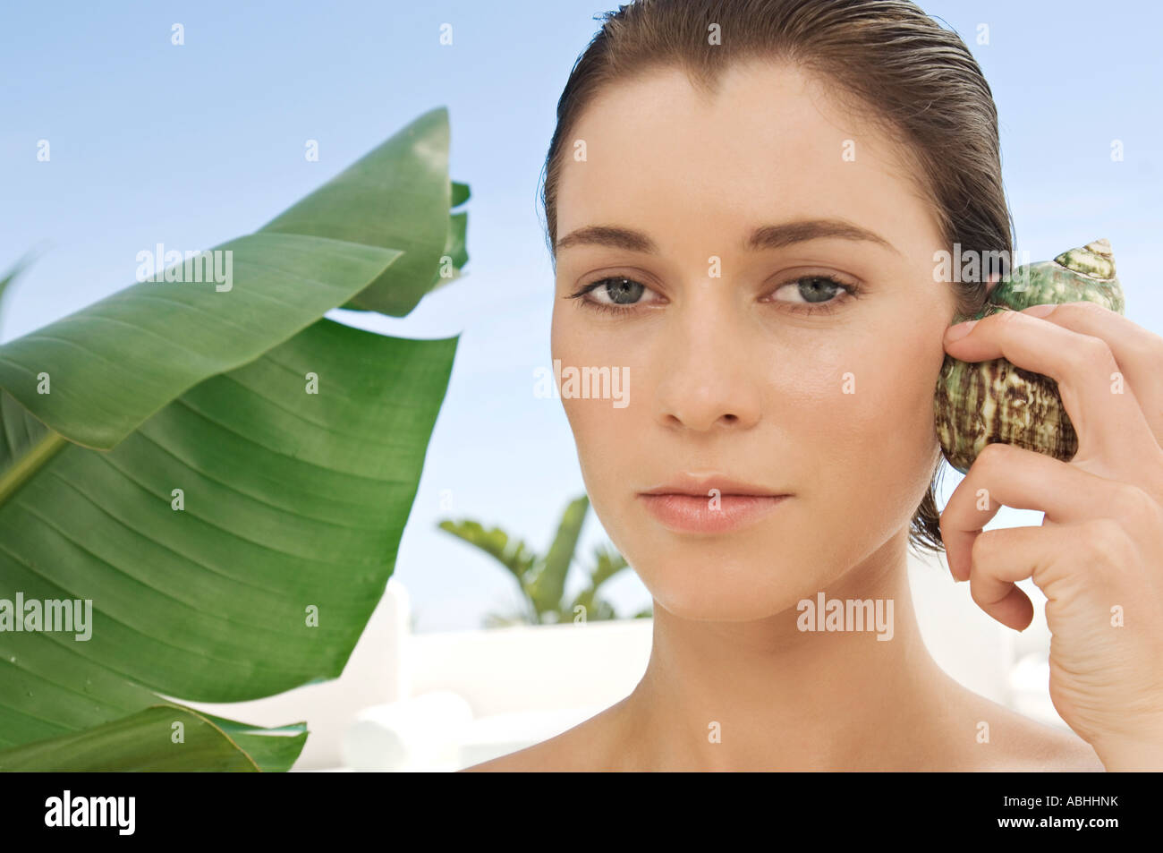 Woman shell ear hi-res stock photography and images - Alamy