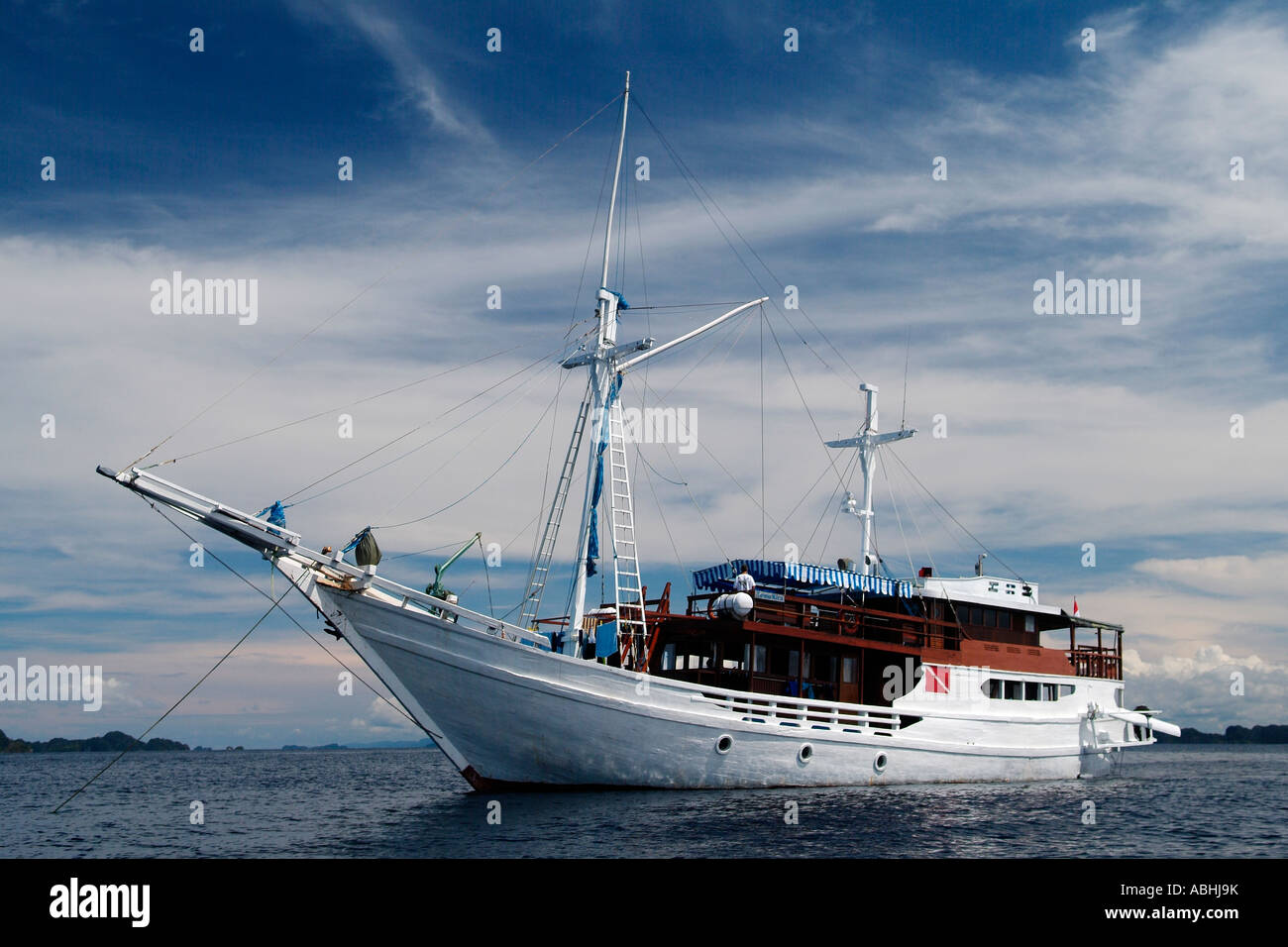 Diving wooden boat anchored in Raja Ampat, Indonesia Stock Photo - Alamy