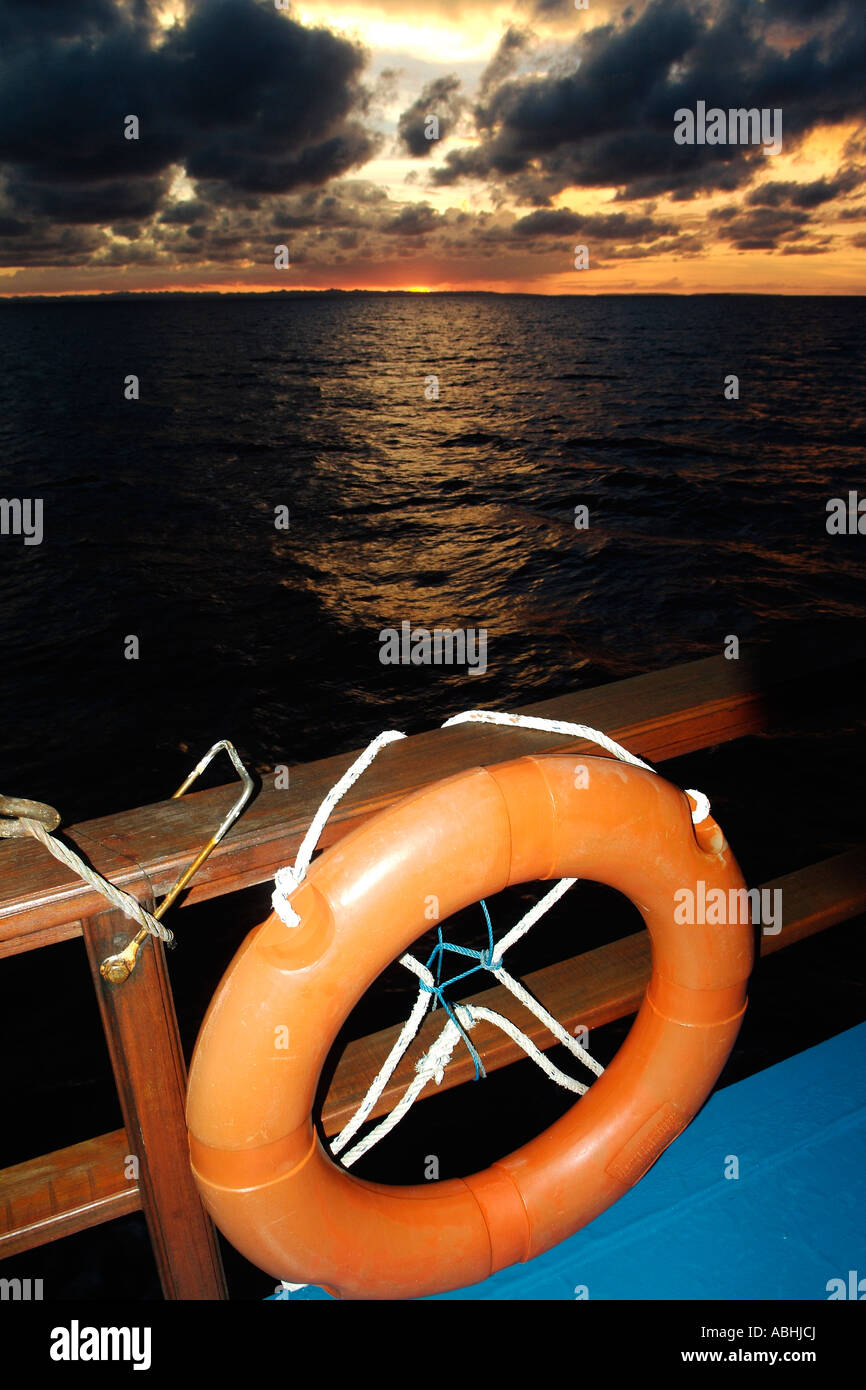 Orange lifebuoy on a diving boat in Raja Ampat, Indonesia Stock Photo ...