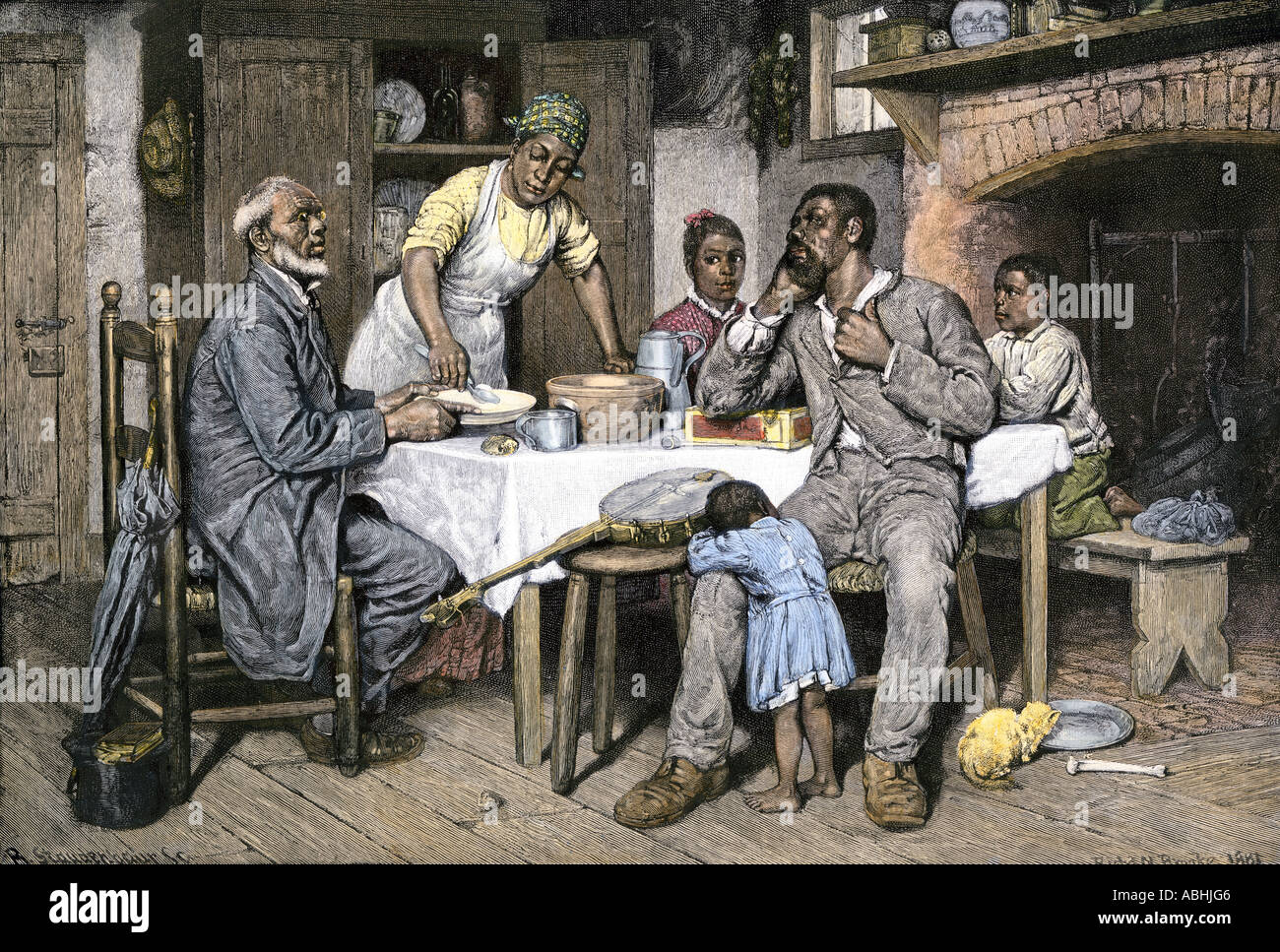 Visiting pastor having dinner with an African American family in the ...