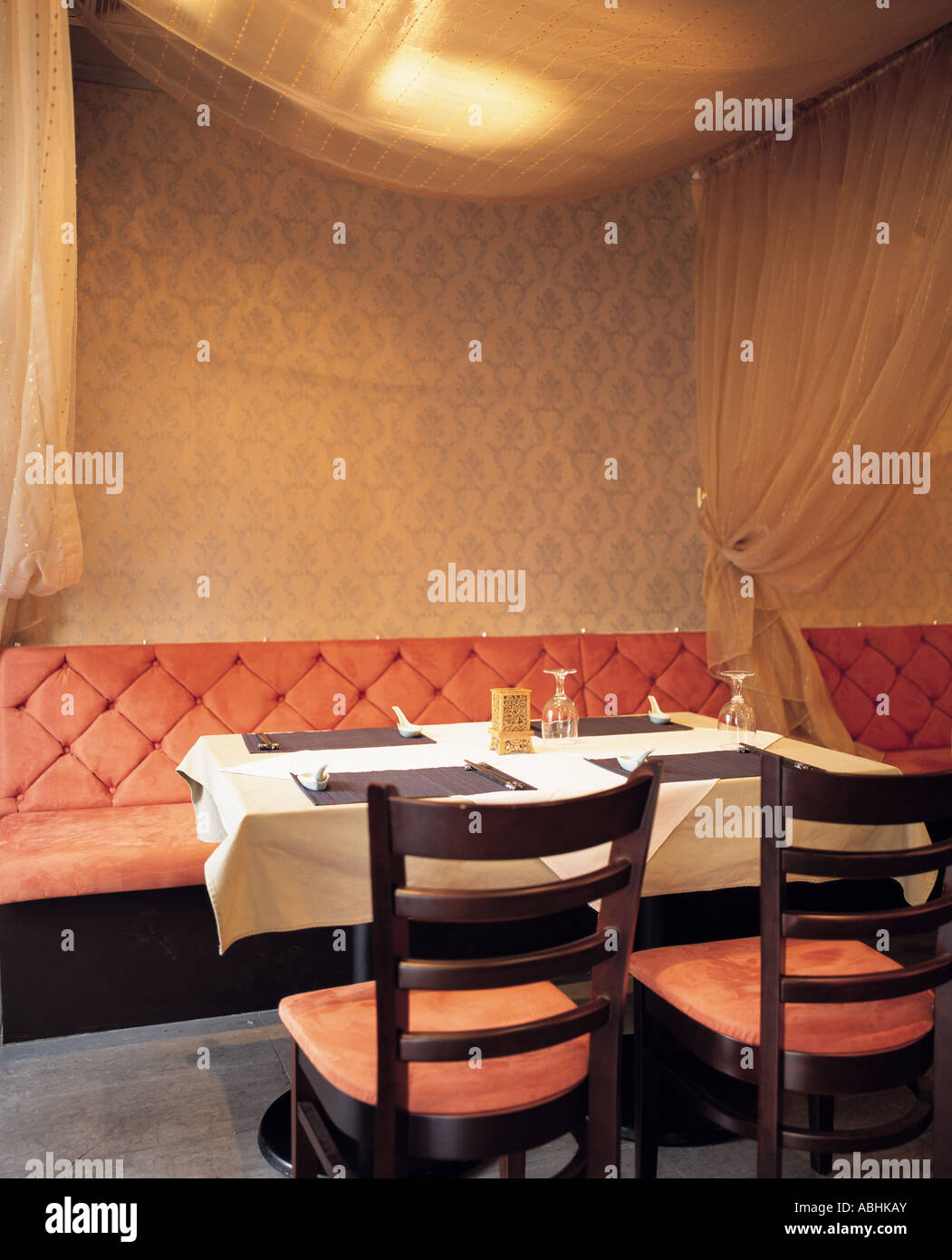 Restaurant dining table and seat Stock Photo - Alamy