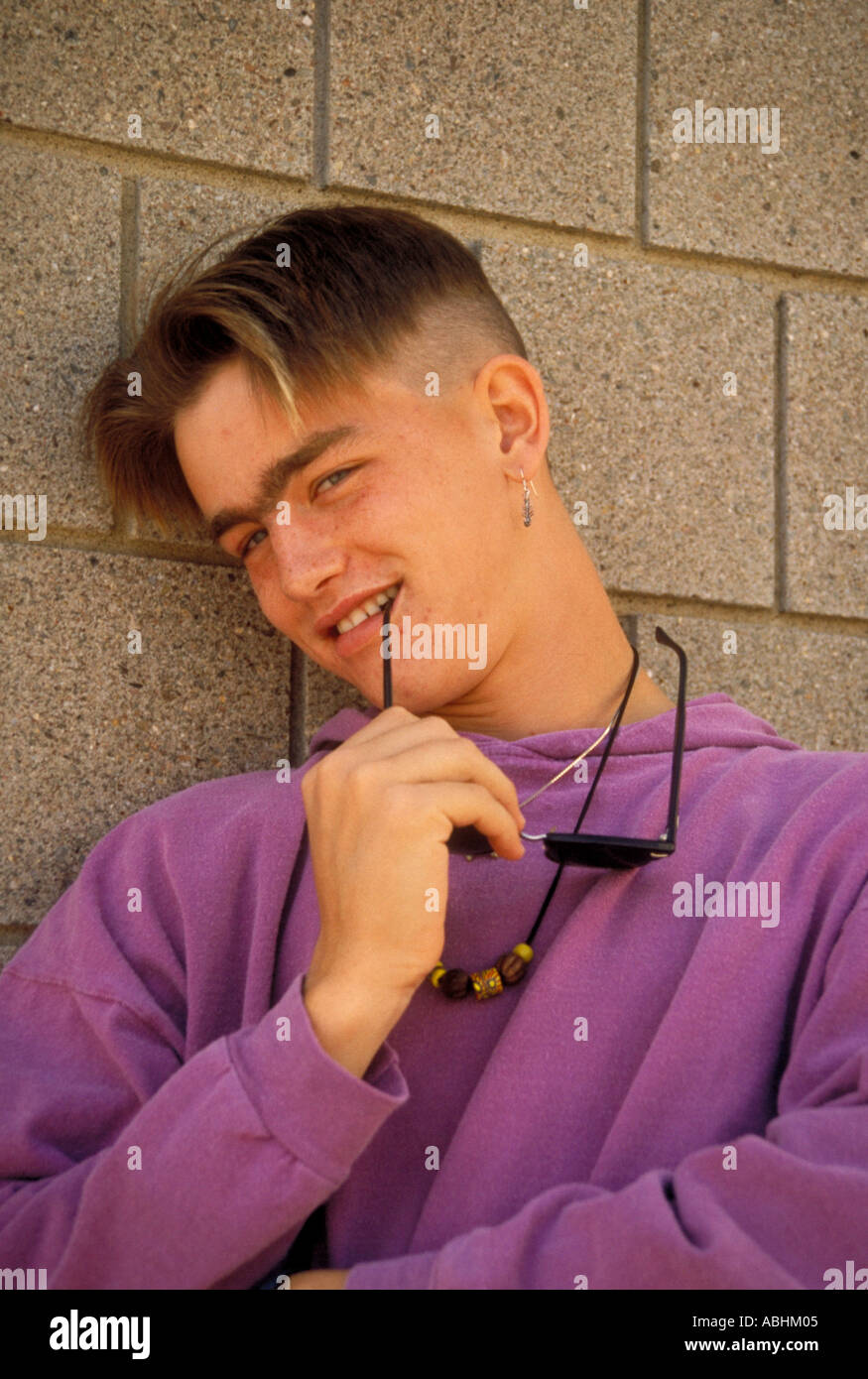 Coy teen boy hi-res stock photography and images - Alamy