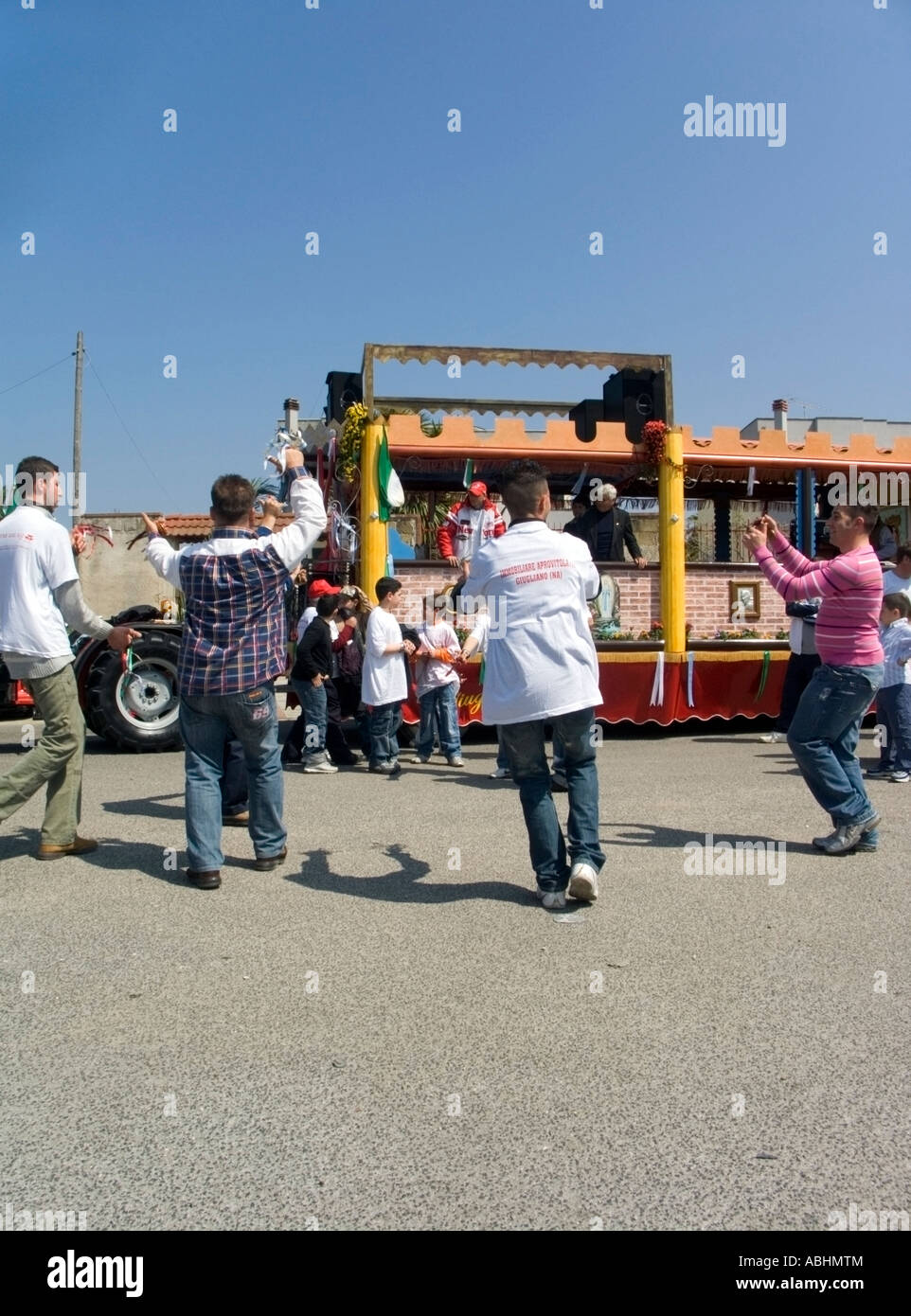 peole dancing folk tarantella in giugliano naples , south of italy ...