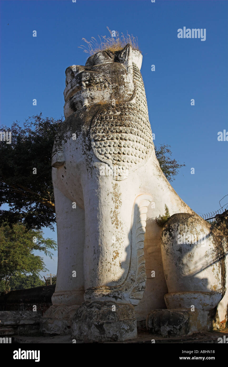 Myanmar Bagan Stone lion standing at rear entrance to Shwezigon Paya ...