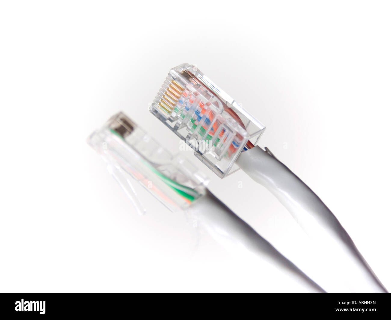 pc rj 45 plug cable close up on a white background Stock Photo - Alamy