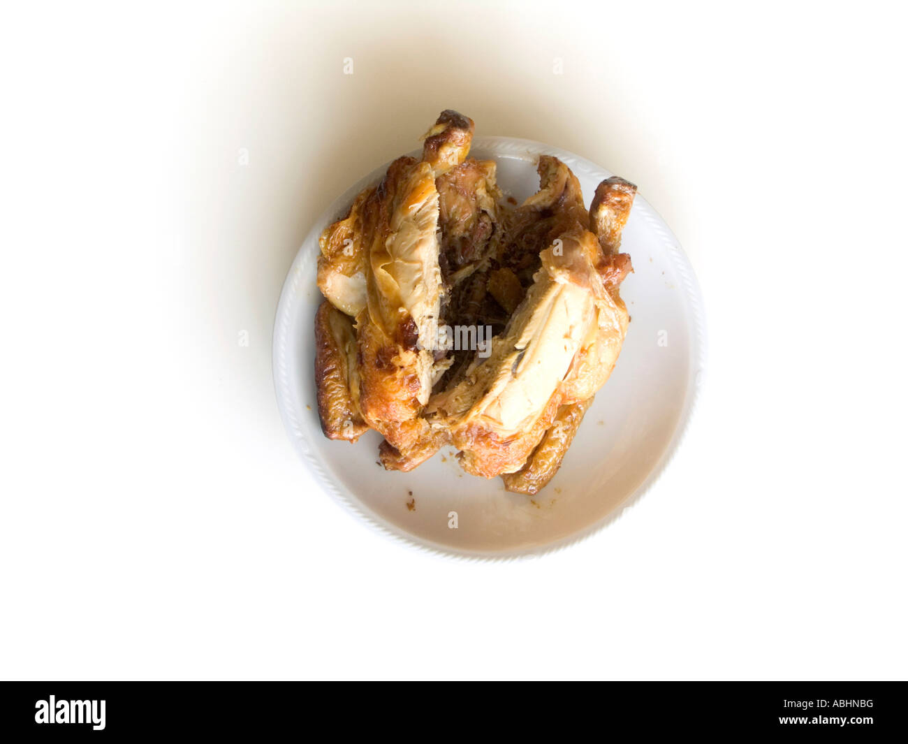roasted chicken close up on a white background Stock Photo - Alamy