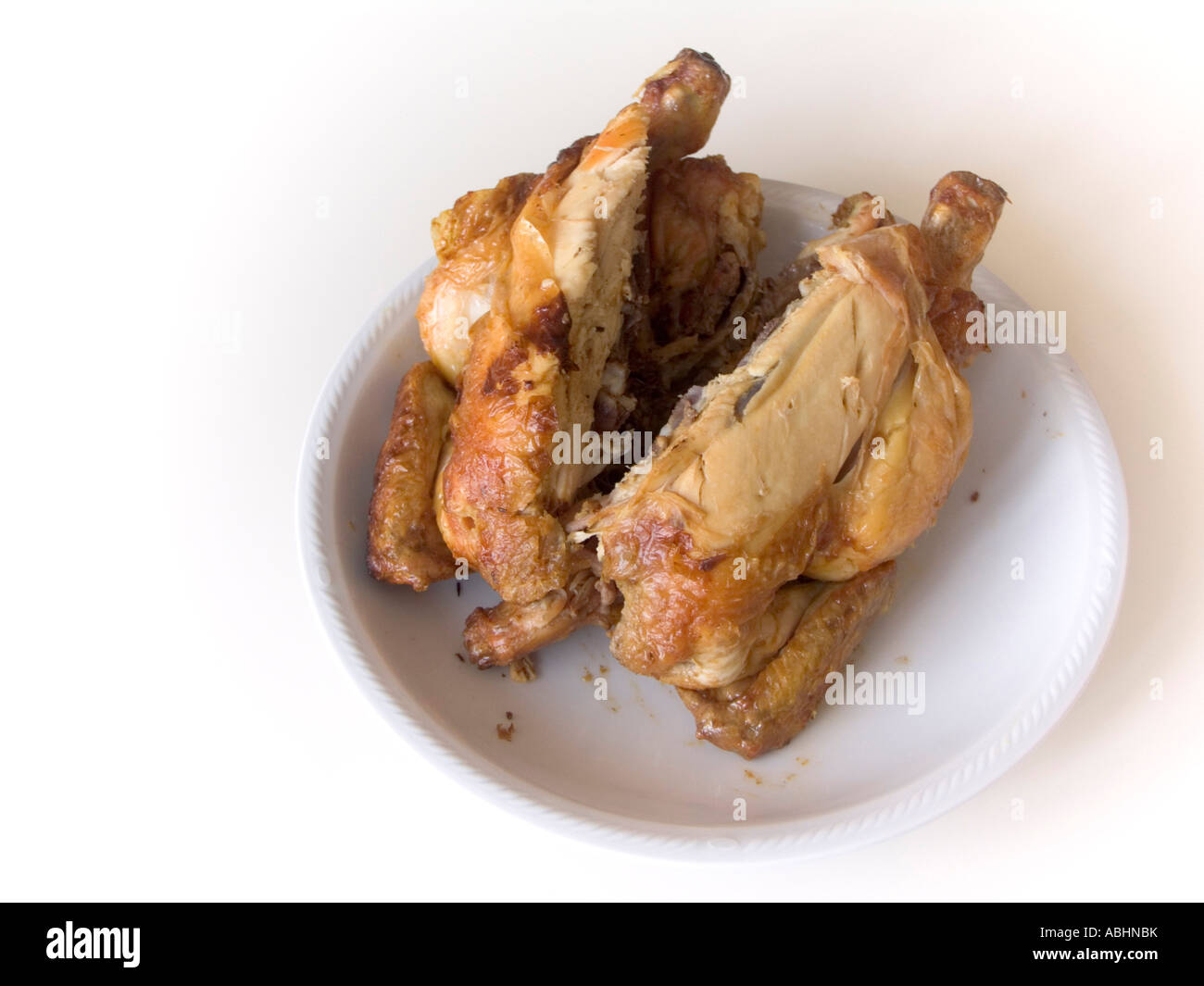 roasted chicken close up on a white background Stock Photo - Alamy