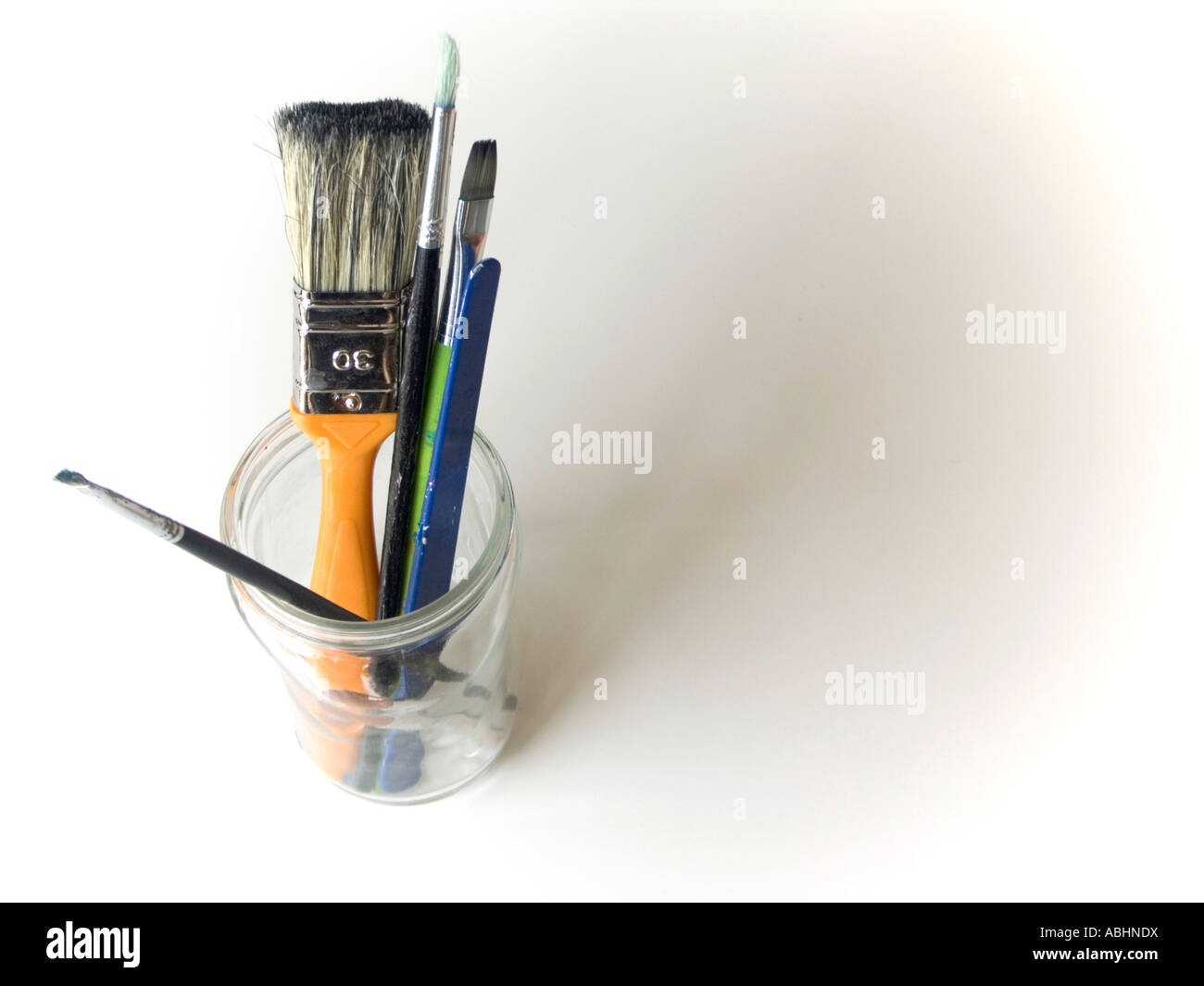 paintbrush close up in a glass bottle on a white background Stock Photo ...