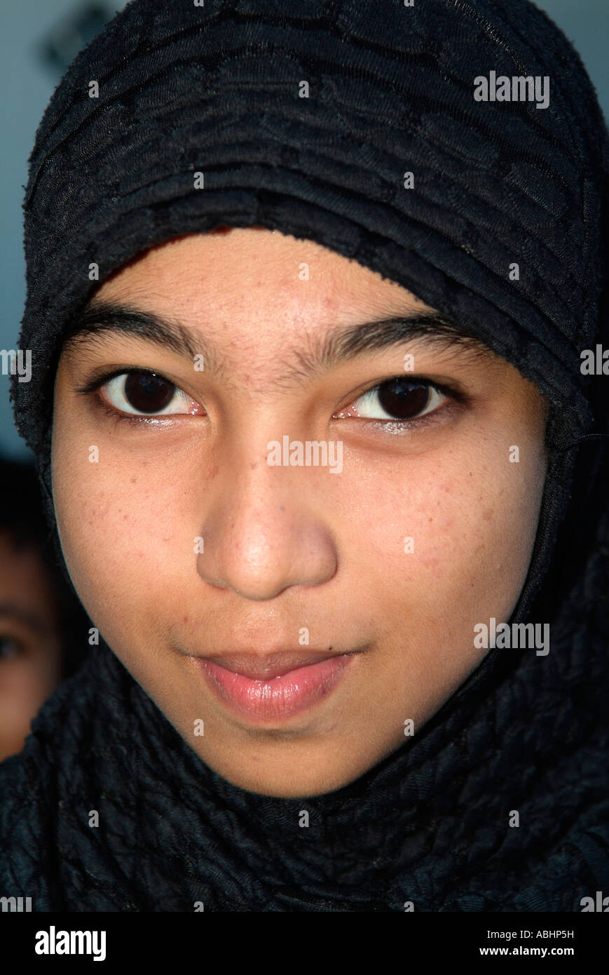Portrait of an muslim Indonesian woman smiling in Manado Stock Photo ...