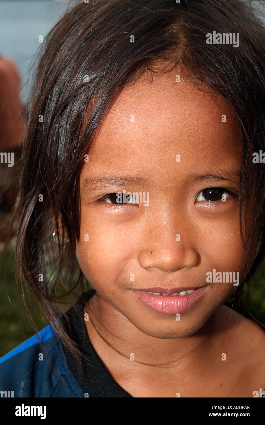 Young indonesian girl smiling, Manado, North Sulawesi Stock Photo - Alamy