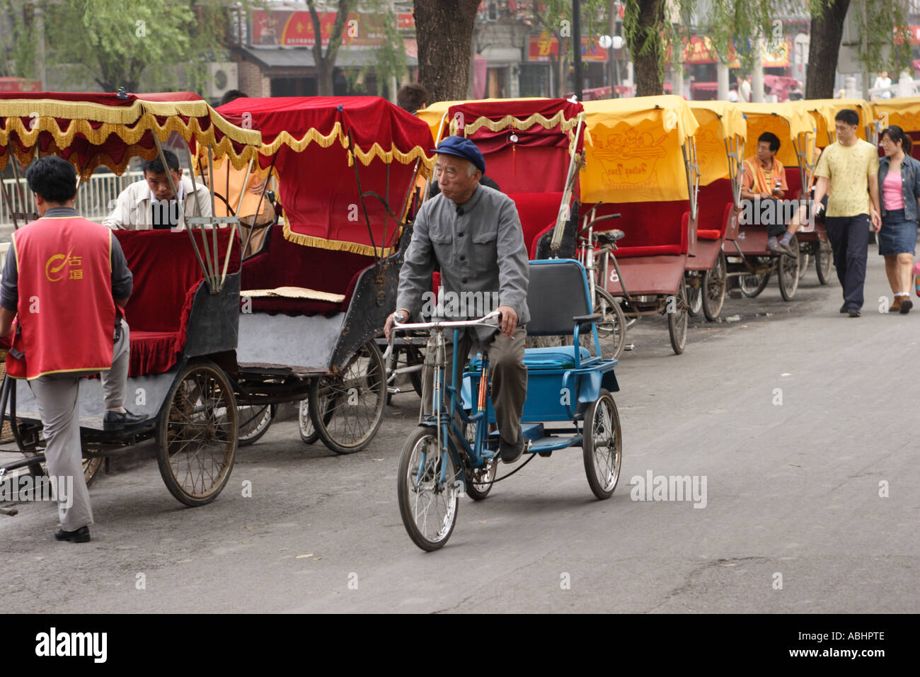 Cycle Rickshaw drivers lined up along Houhai Lake waiting for tourists ...