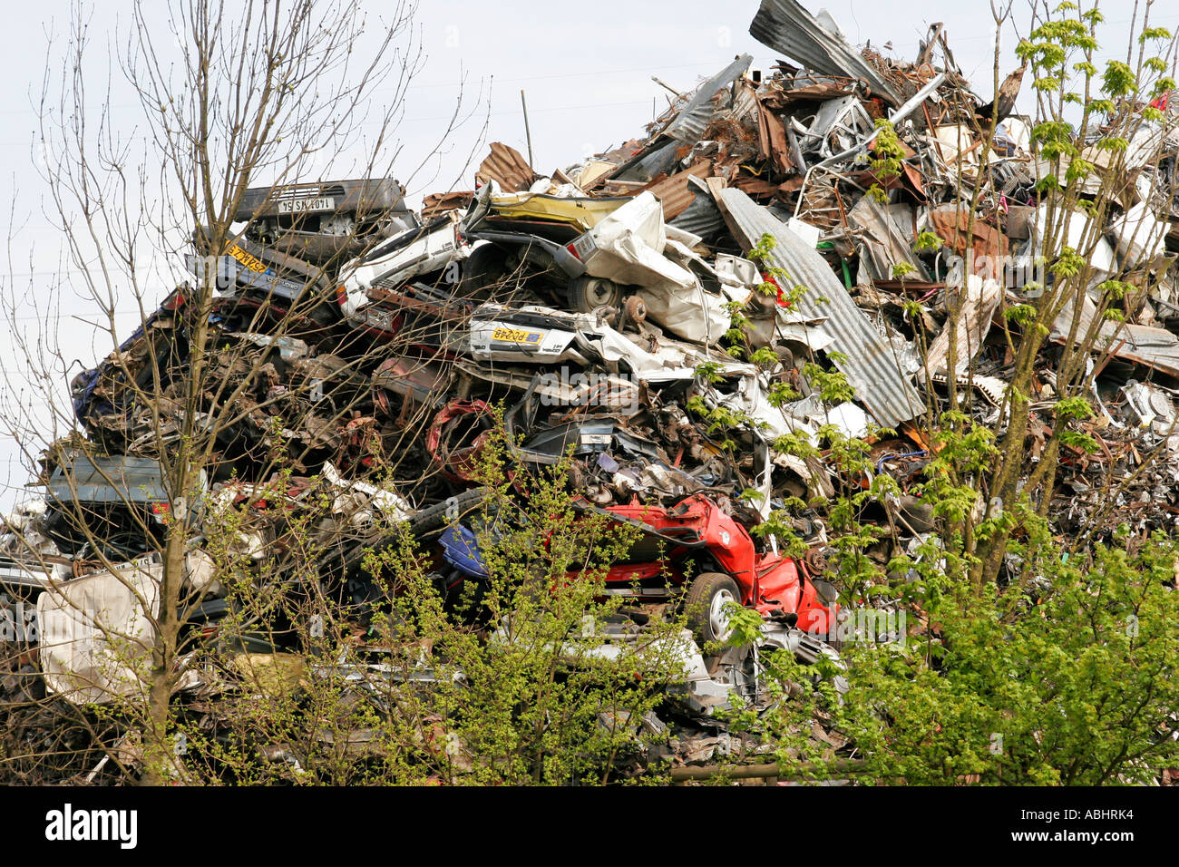 Heap of scrap metal cars waiting to be crushed and recycled Stock Photo ...