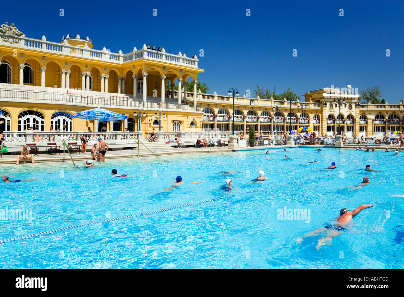 People swimming in open air pool of Szechenyi Baths Pest Budapest ...