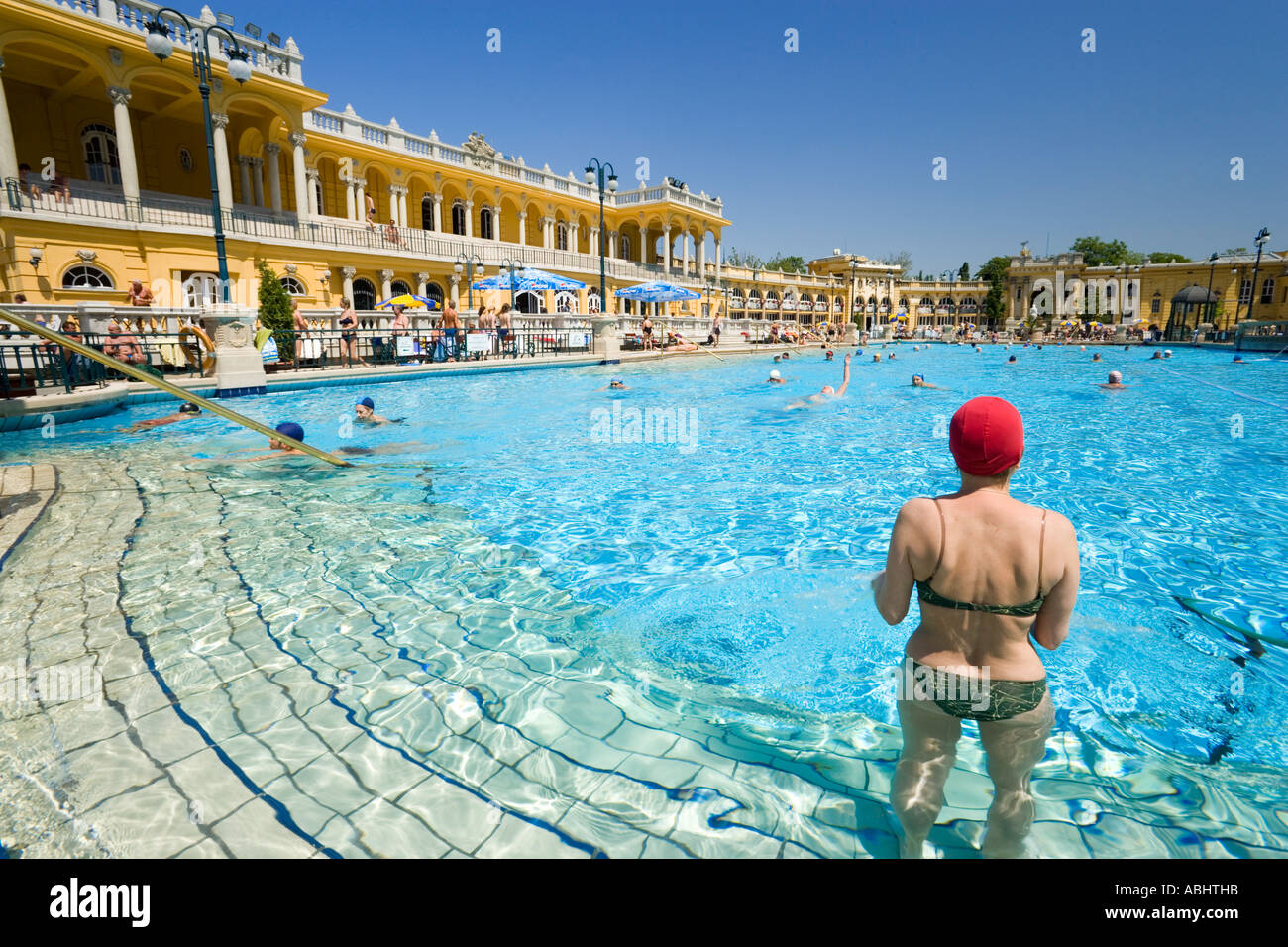 People swimming in open air pool of Szechenyi Baths Pest Budapest ...