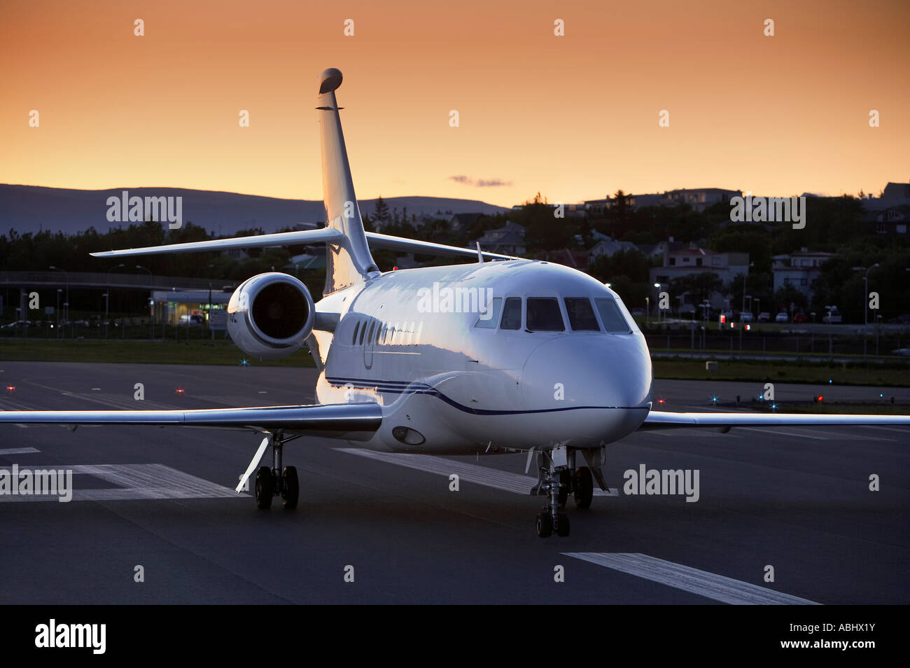 Private jet at Reykjavik airport in the midnight sun Stock Photo - Alamy
