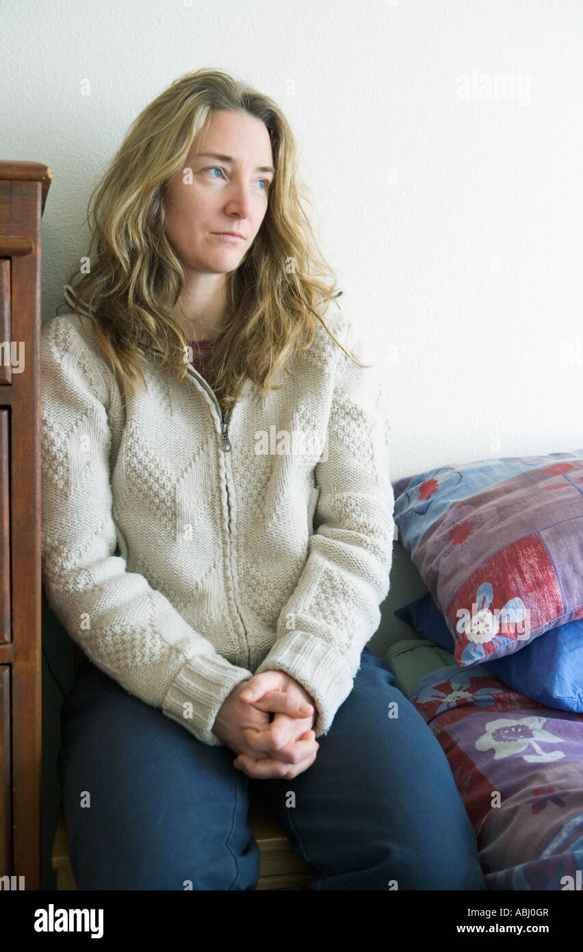 Portrait of serious thoughtful woman Stock Photo - Alamy