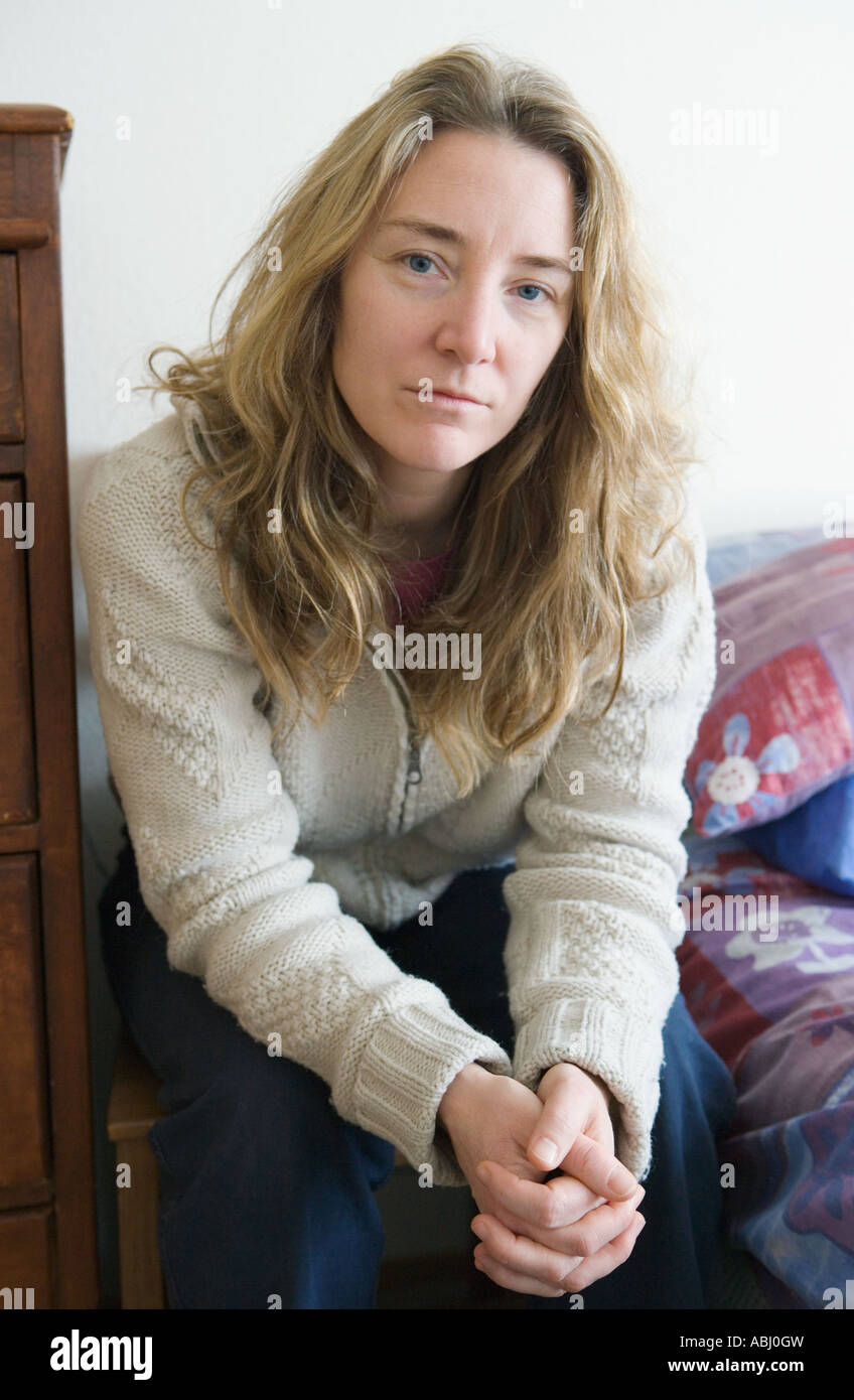 Portrait of serious concerned woman Stock Photo - Alamy