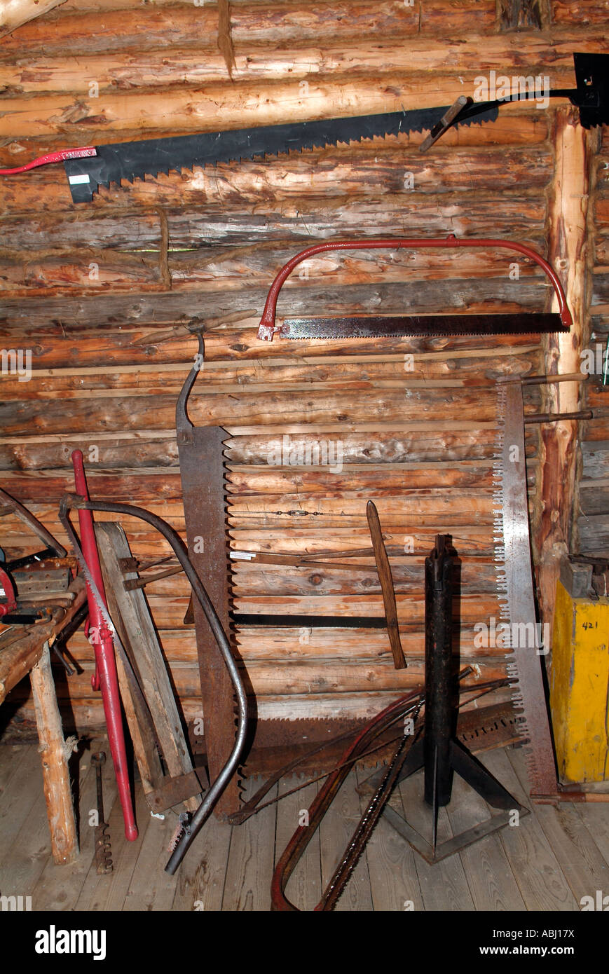 Display of saws hanging on a wall inside a forge Stock Photo - Alamy