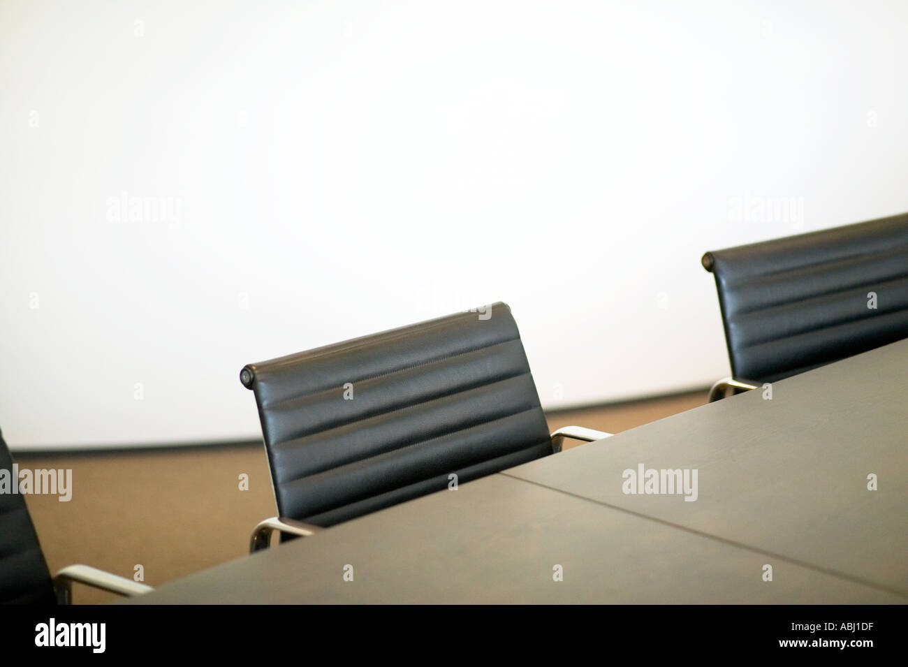 empty chair at office board room table Stock Photo - Alamy