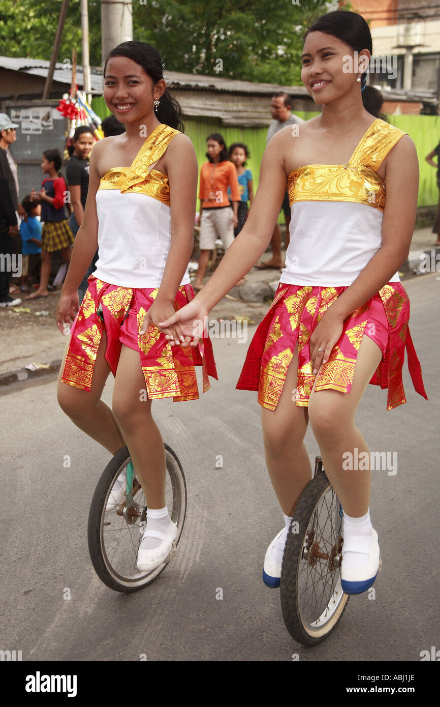Indonesian girls on cycles, New Year's Eve parade, Bali, Indonesia ...