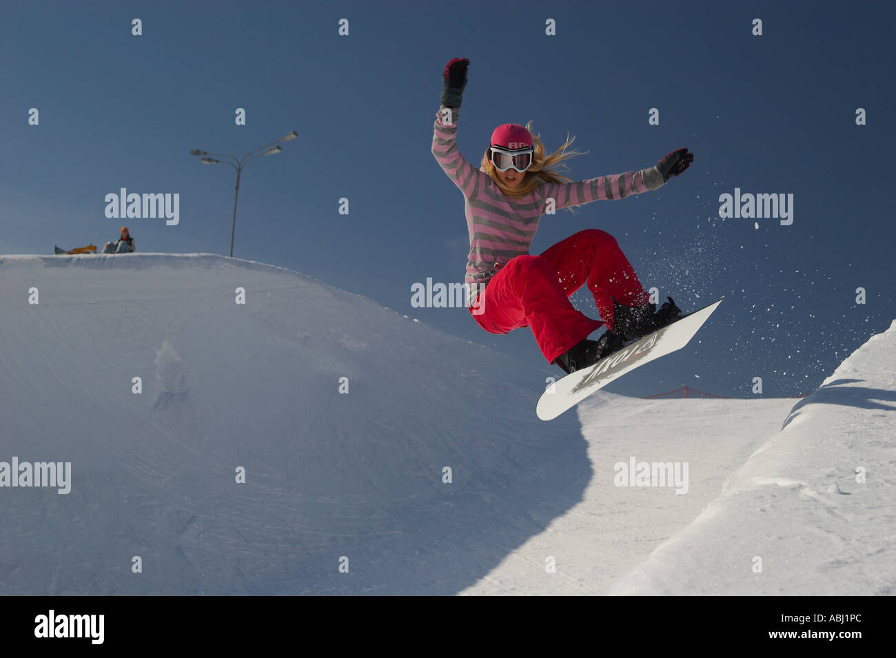 Snowboard girl and half pipe ride 7 Stock Photo - Alamy
