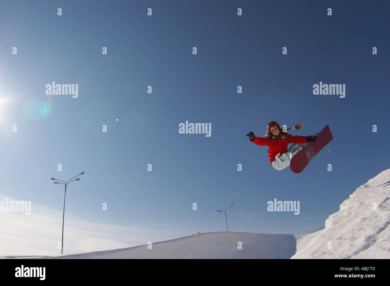 Snowboard girl and half pipe ride - trick with nice grab Stock Photo ...
