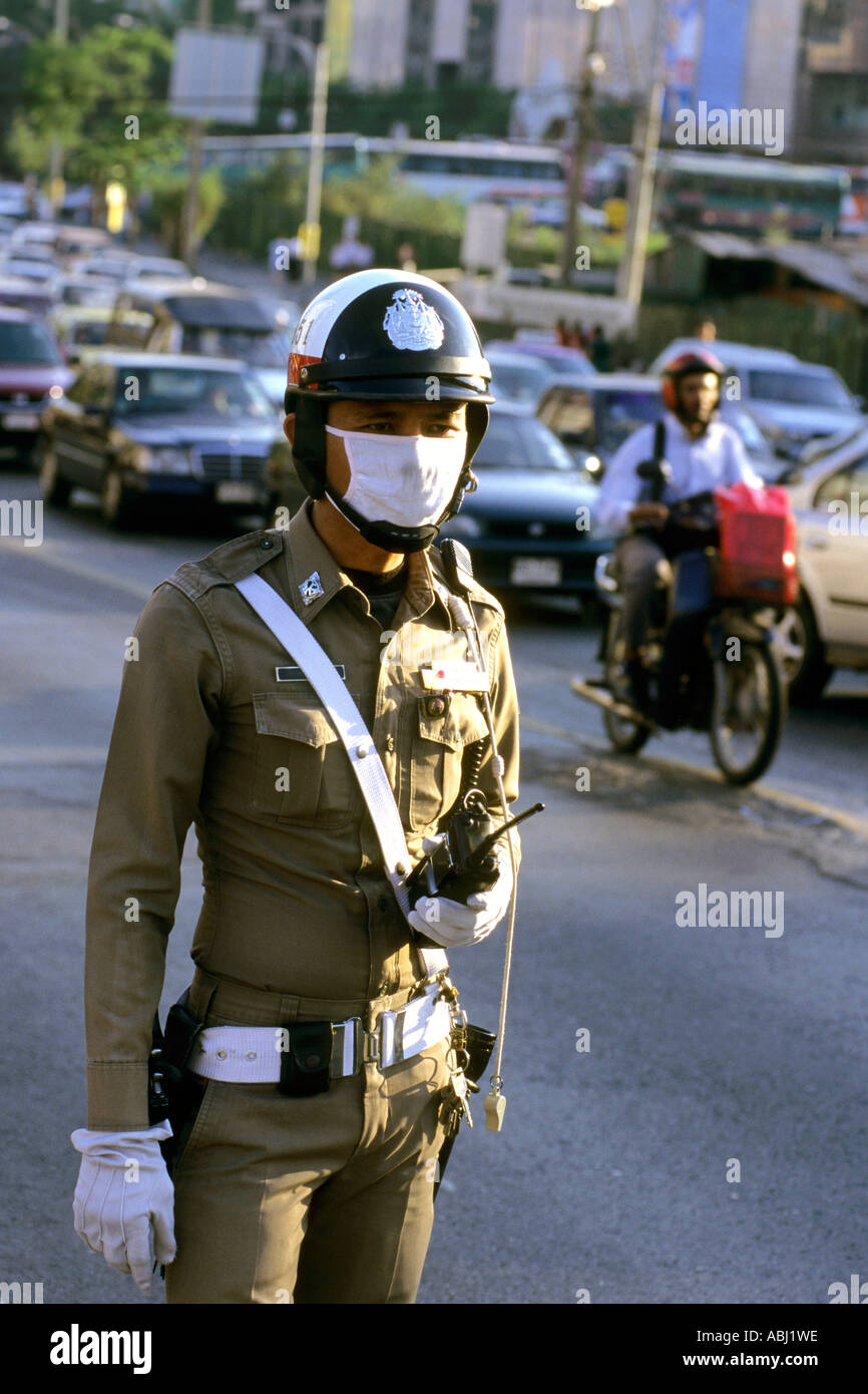 Traffic policeman with face mask, Bangkok, Thailand Stock Photo - Alamy