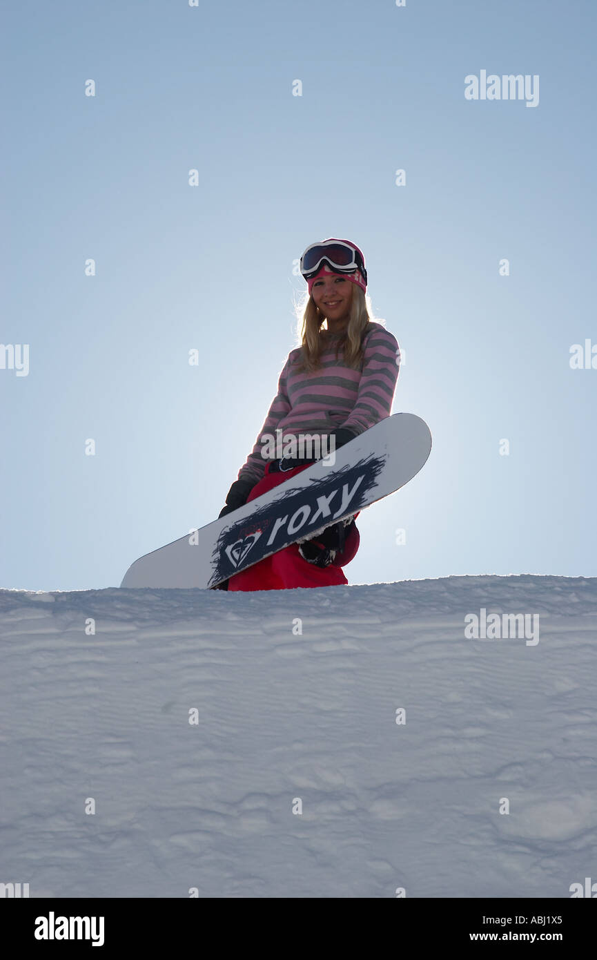 Beautiful snowboard girls on the half pipe edge 2 Stock Photo - Alamy