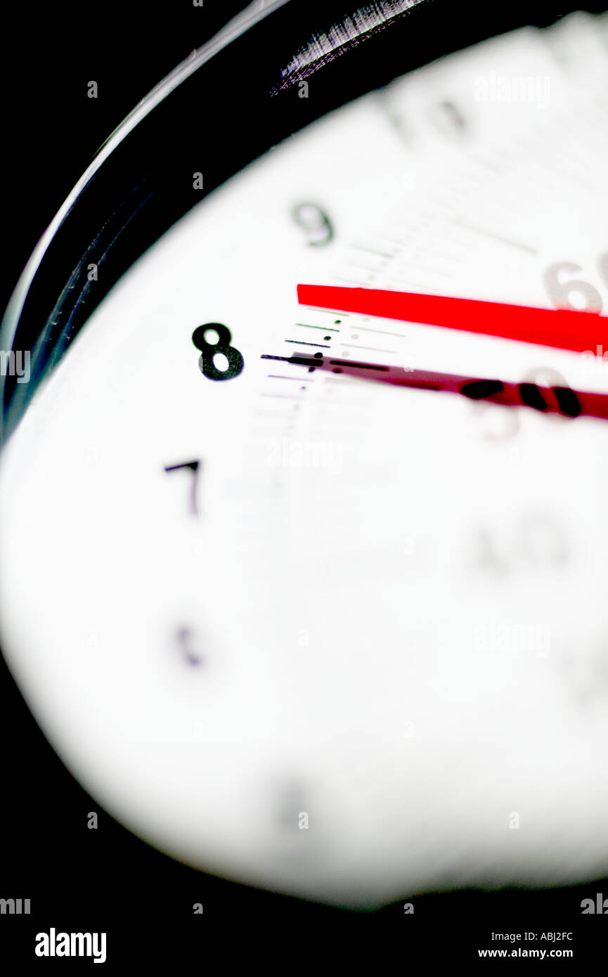 Needle pointing to weight on dial of weighing scale Stock Photo - Alamy