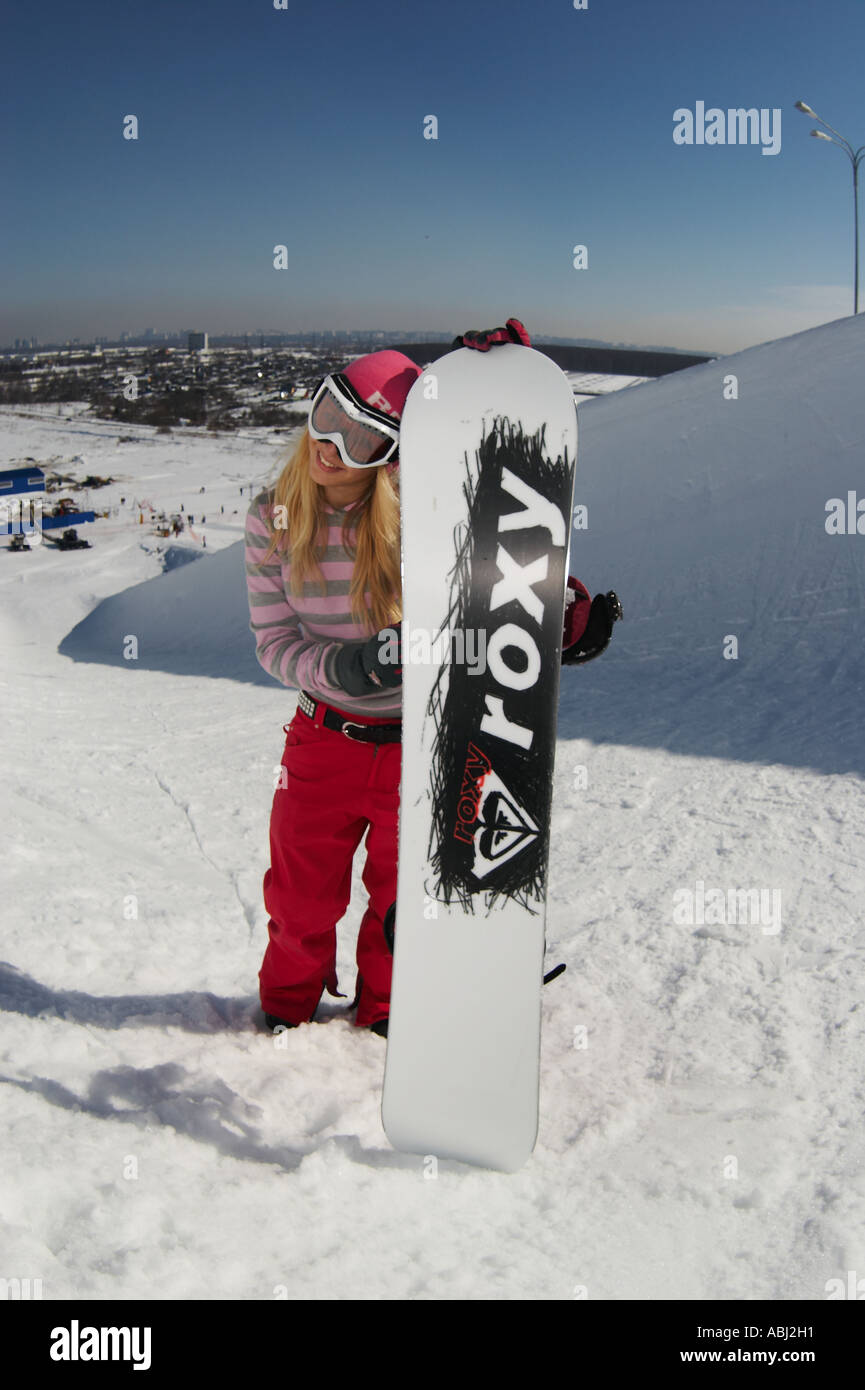 Beauty snowboard girl with her board on the top of half pipe Stock ...
